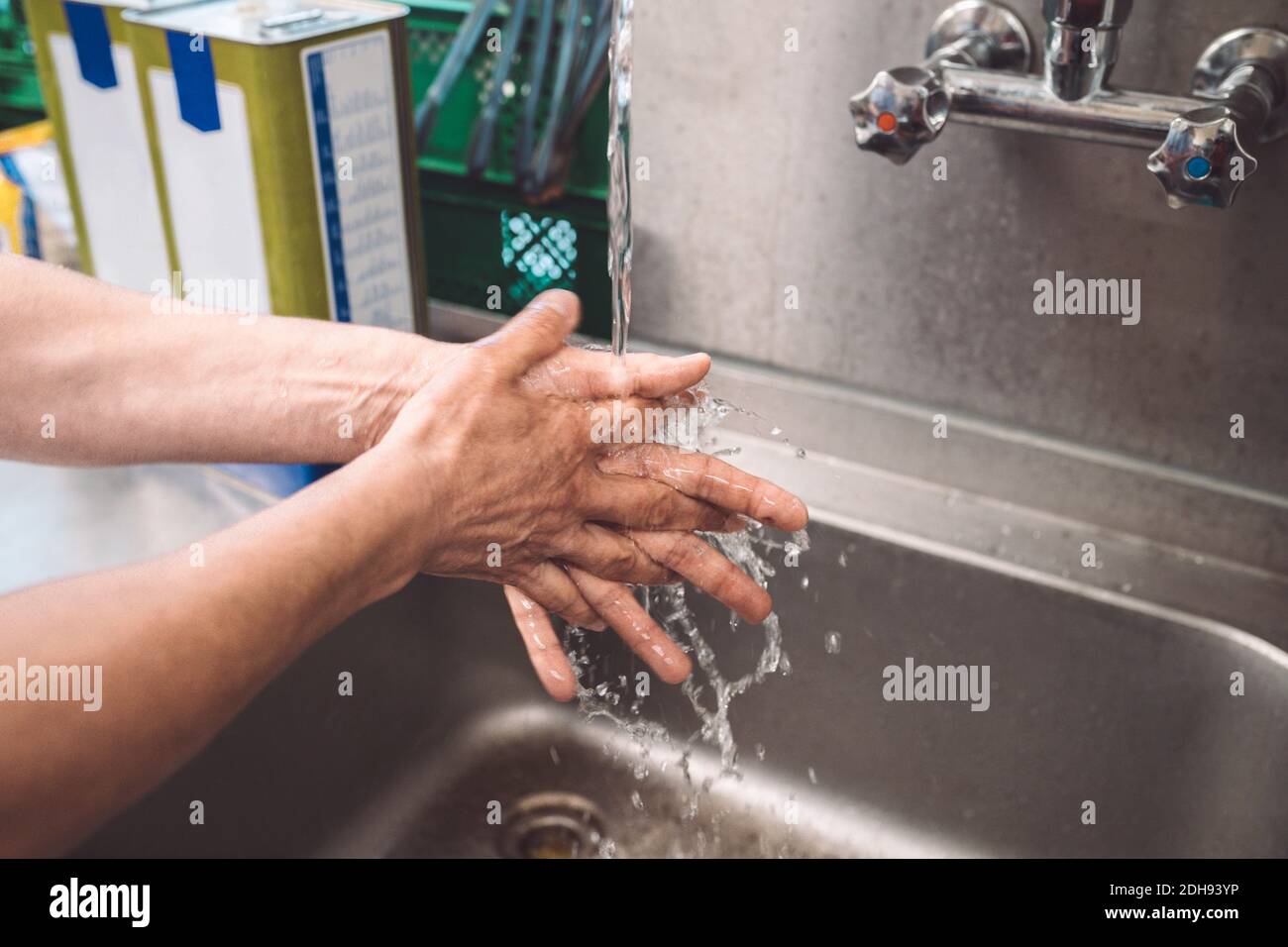 Cook washing hands hi-res stock photography and images - Alamy
