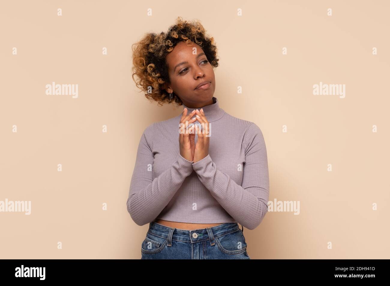 Cunning african woman indenting to realize tricky plan. Attractive ...