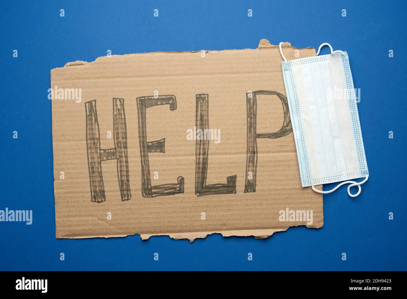 Piece cardboard word help hi-res stock photography and images - Alamy
