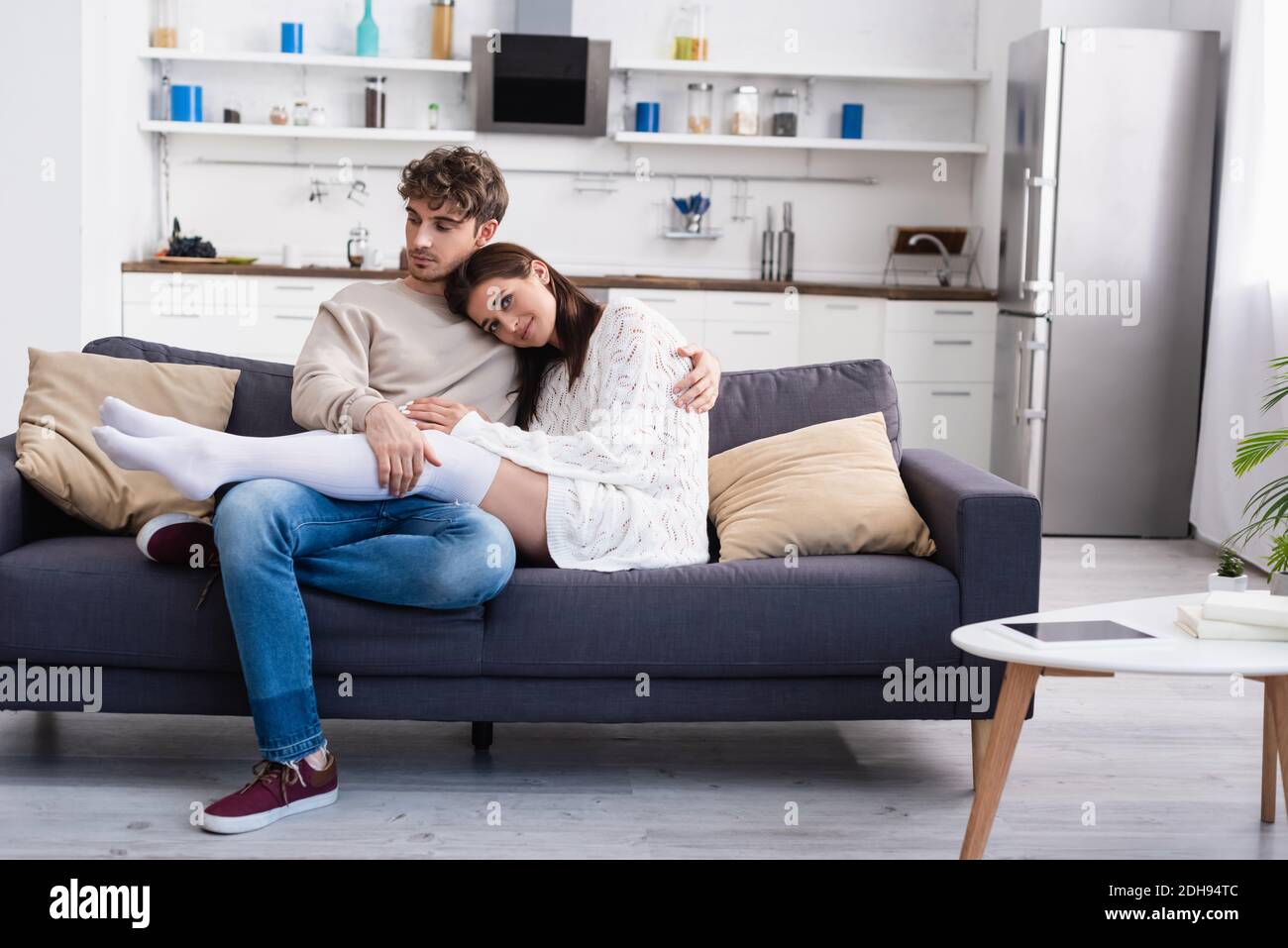 Woman socks couch hi-res stock photography and images - Alamy