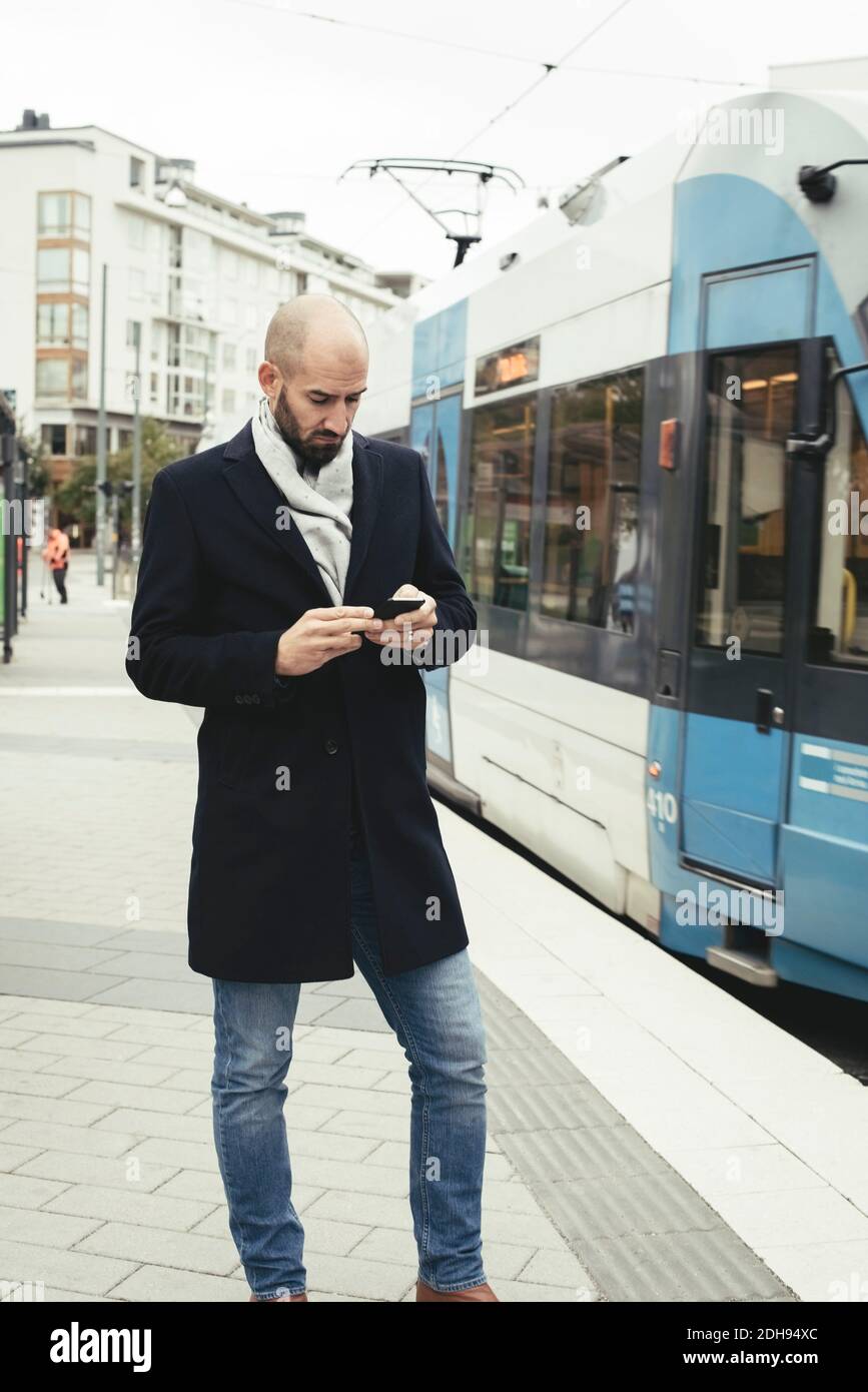 Tram on stop in hi-res stock photography and images - Alamy