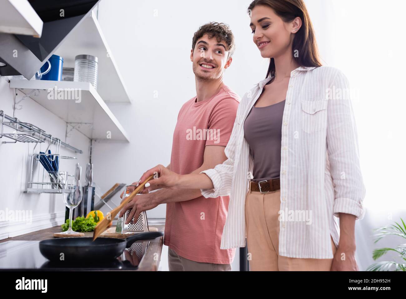 Lovers cooking together in kitchen hi-res stock photography and images ...