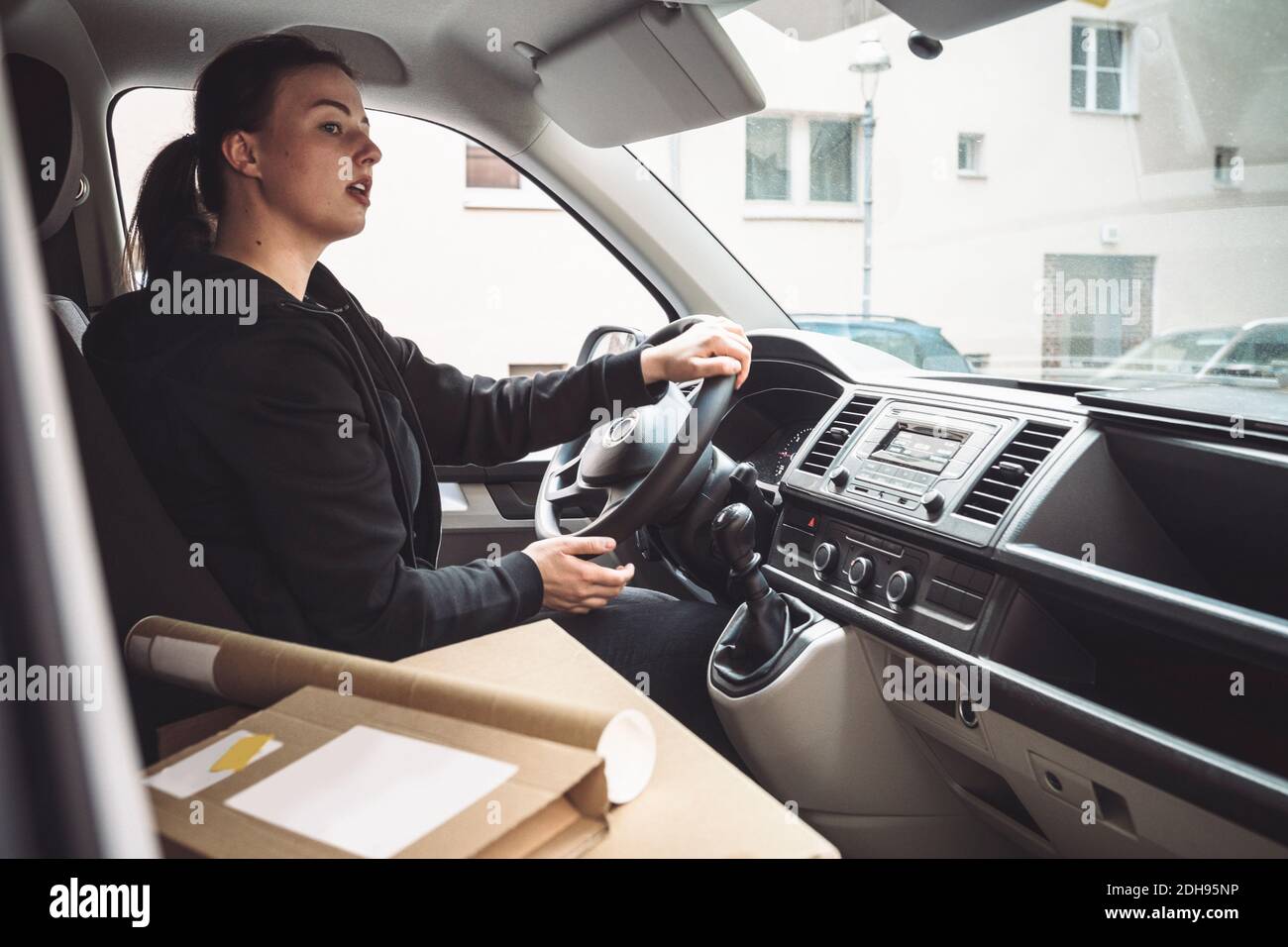 Women driver moving box hi-res stock photography and images - Alamy