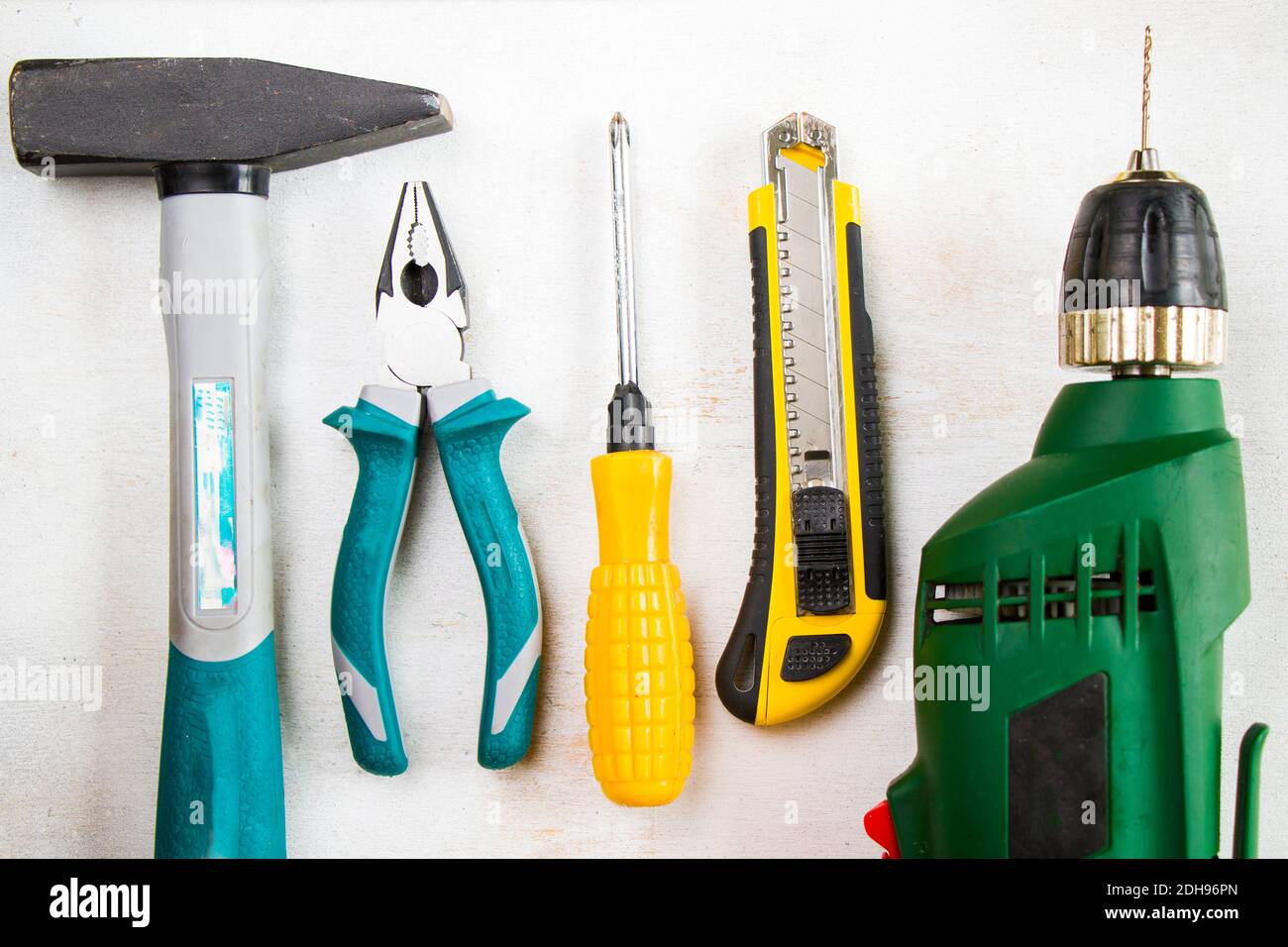 Building instrument set on the white background, tape measure, pliers ...