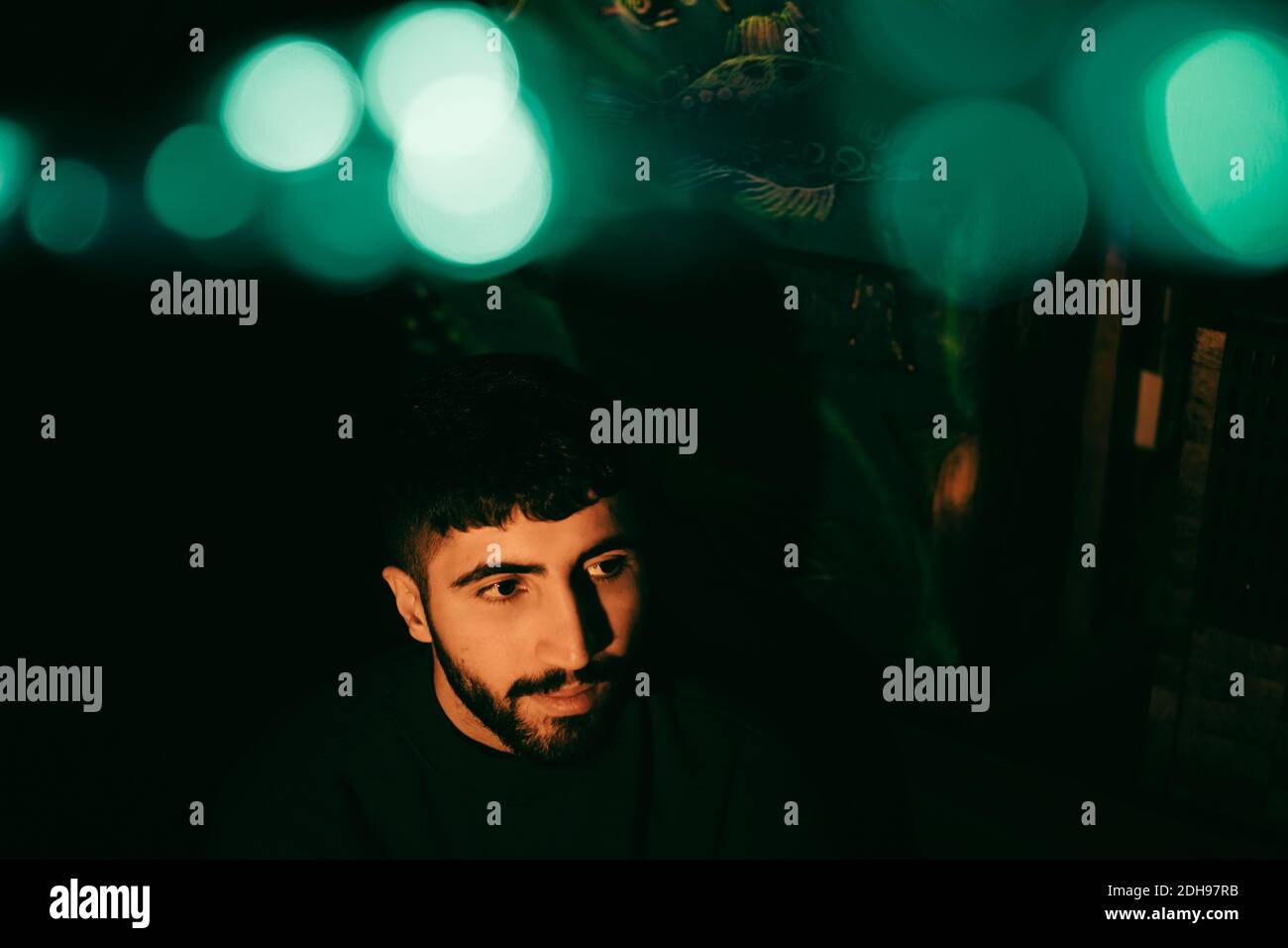 Man under fluorescent light hi-res stock photography and images - Alamy