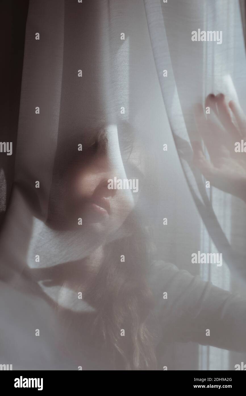 Hiding behind curtain hi-res stock photography and images - Alamy