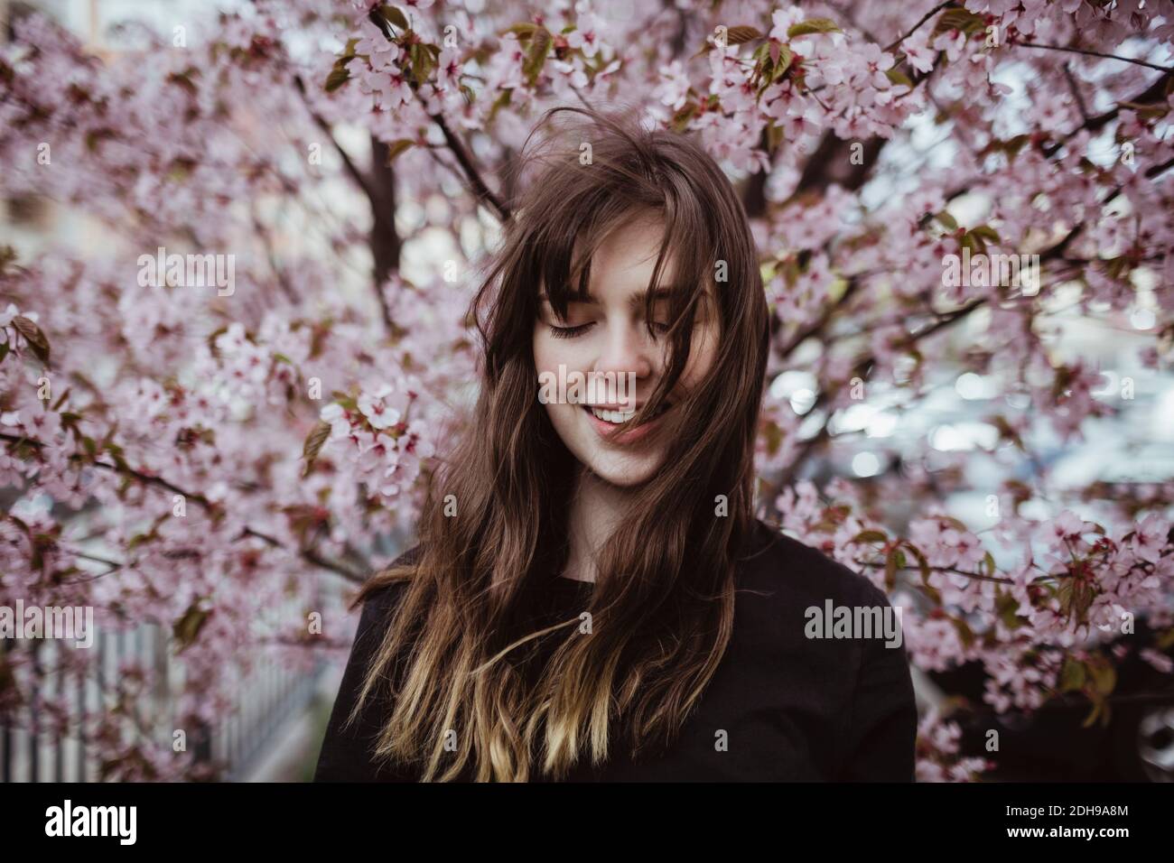 smiling young woman Stock Photo - Alamy