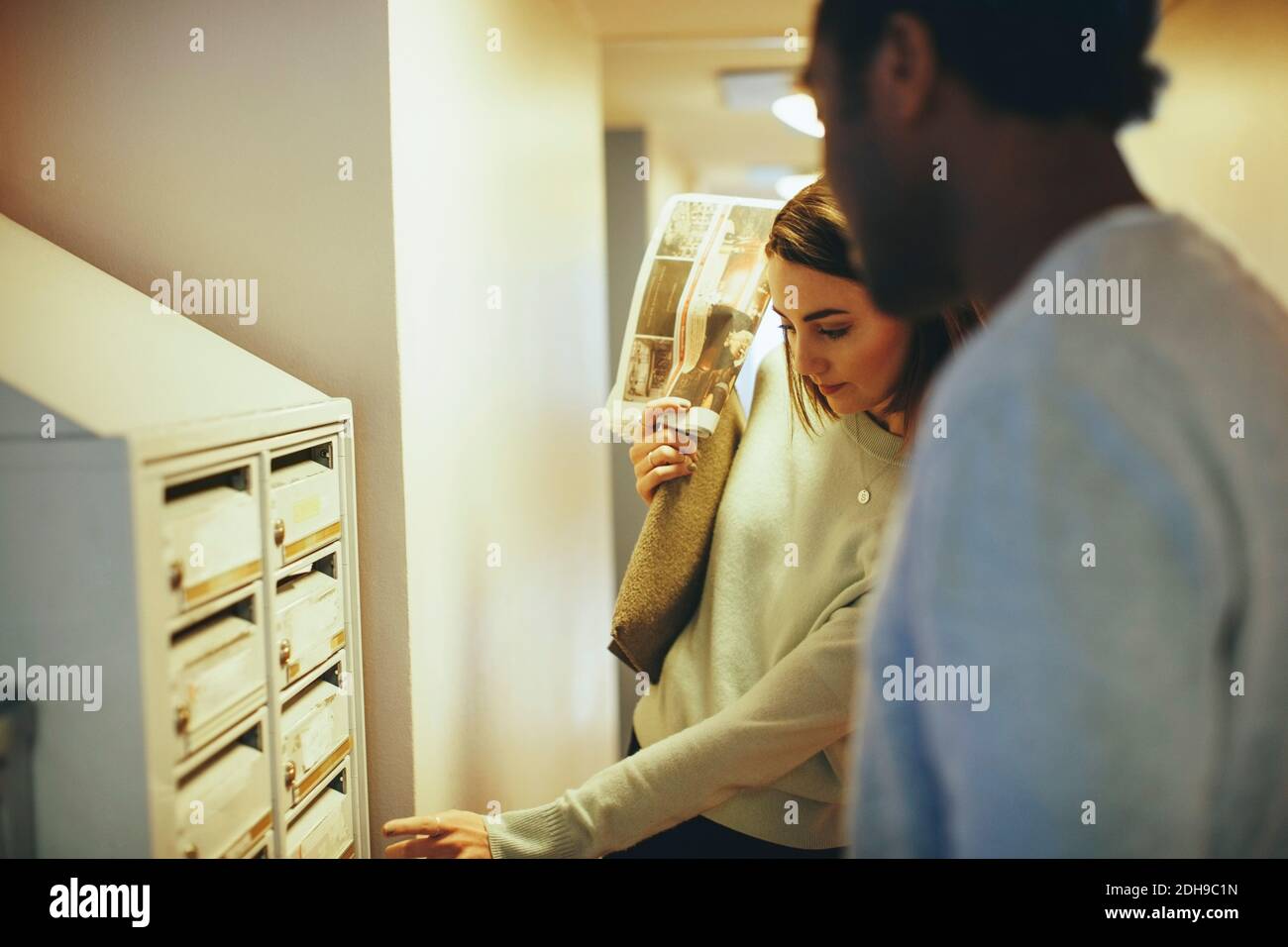 Person at mailbox hi-res stock photography and images - Alamy