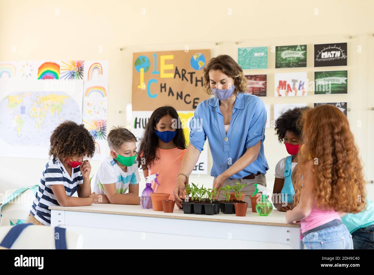 Male teacher wearing face mask hi-res stock photography and images - Alamy