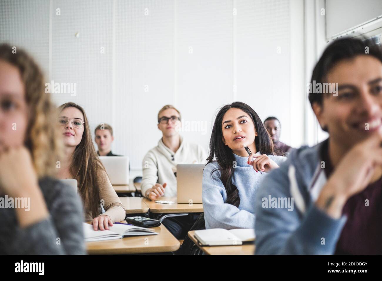 Students sitting desks in classroom hi-res stock photography and images ...