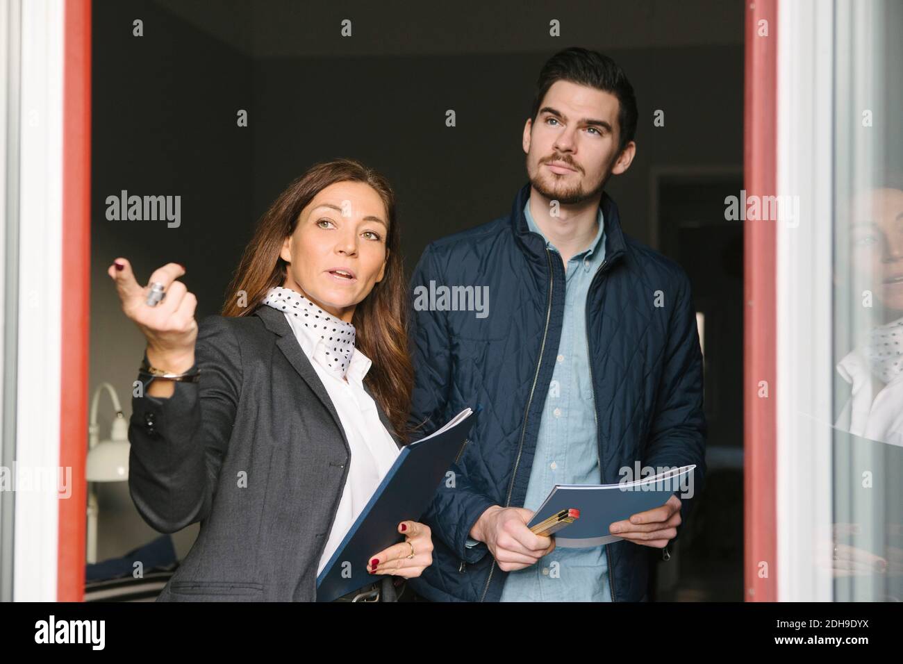 Real estate agent showing pointing hi-res stock photography and images ...