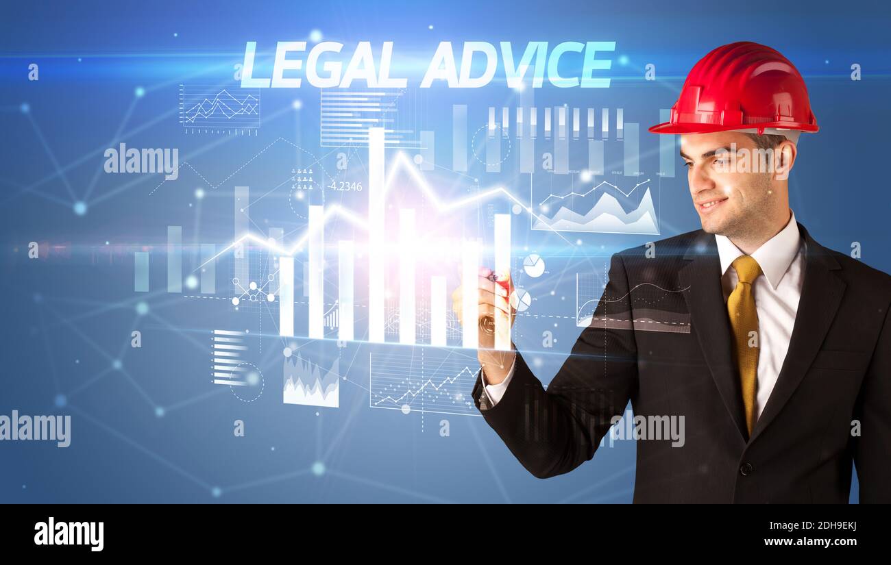 Handsome businessman with helmet drawing LEGAL ADVICE inscription ...