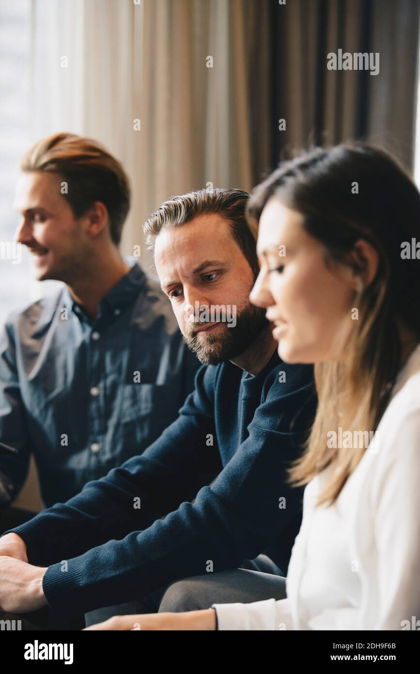 Working with colleagues hi-res stock photography and images - Alamy