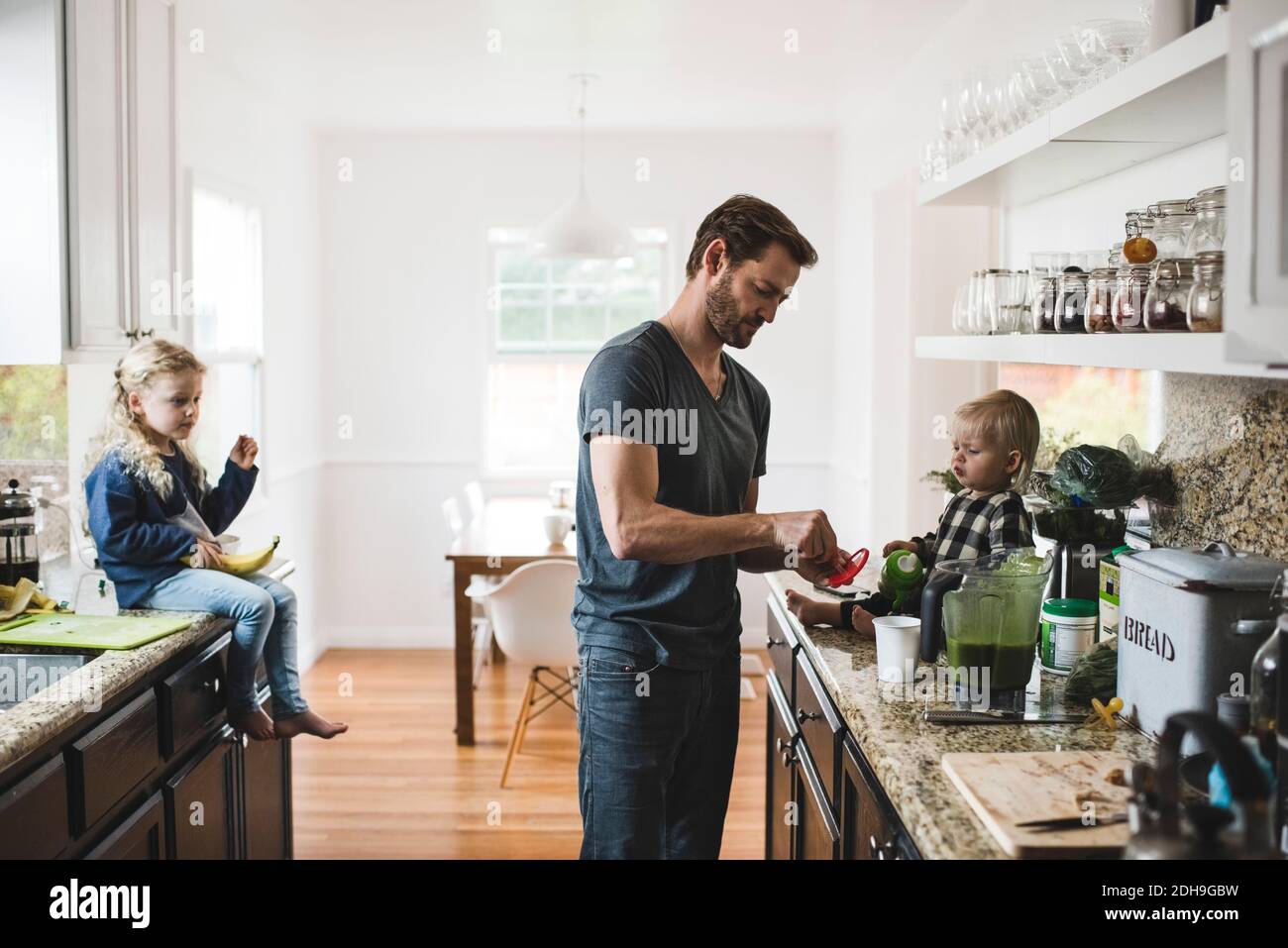 Cooking with children in community hi-res stock photography and images ...
