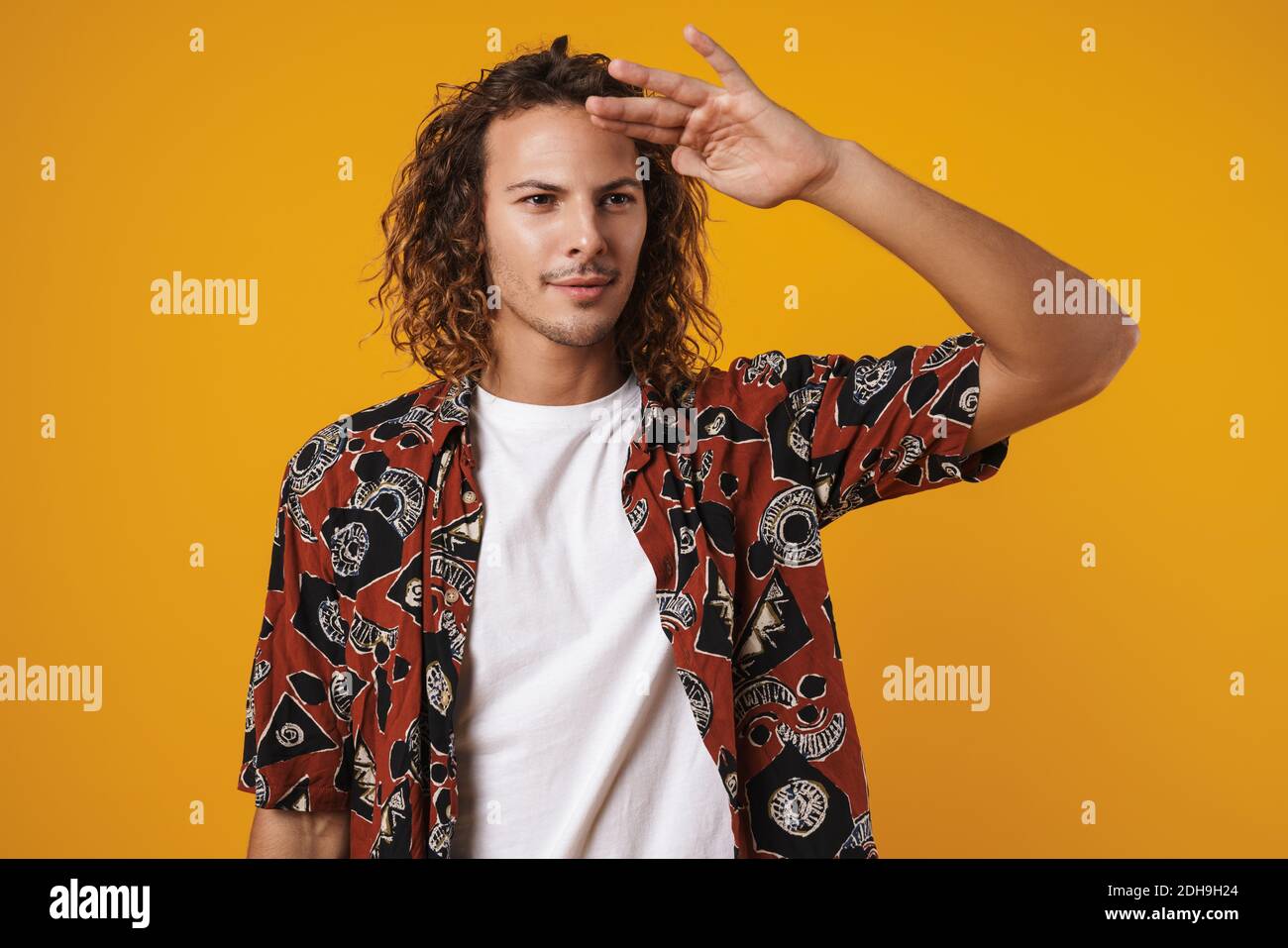 Photo of focused handsome guy posing and looking aside isolated over ...