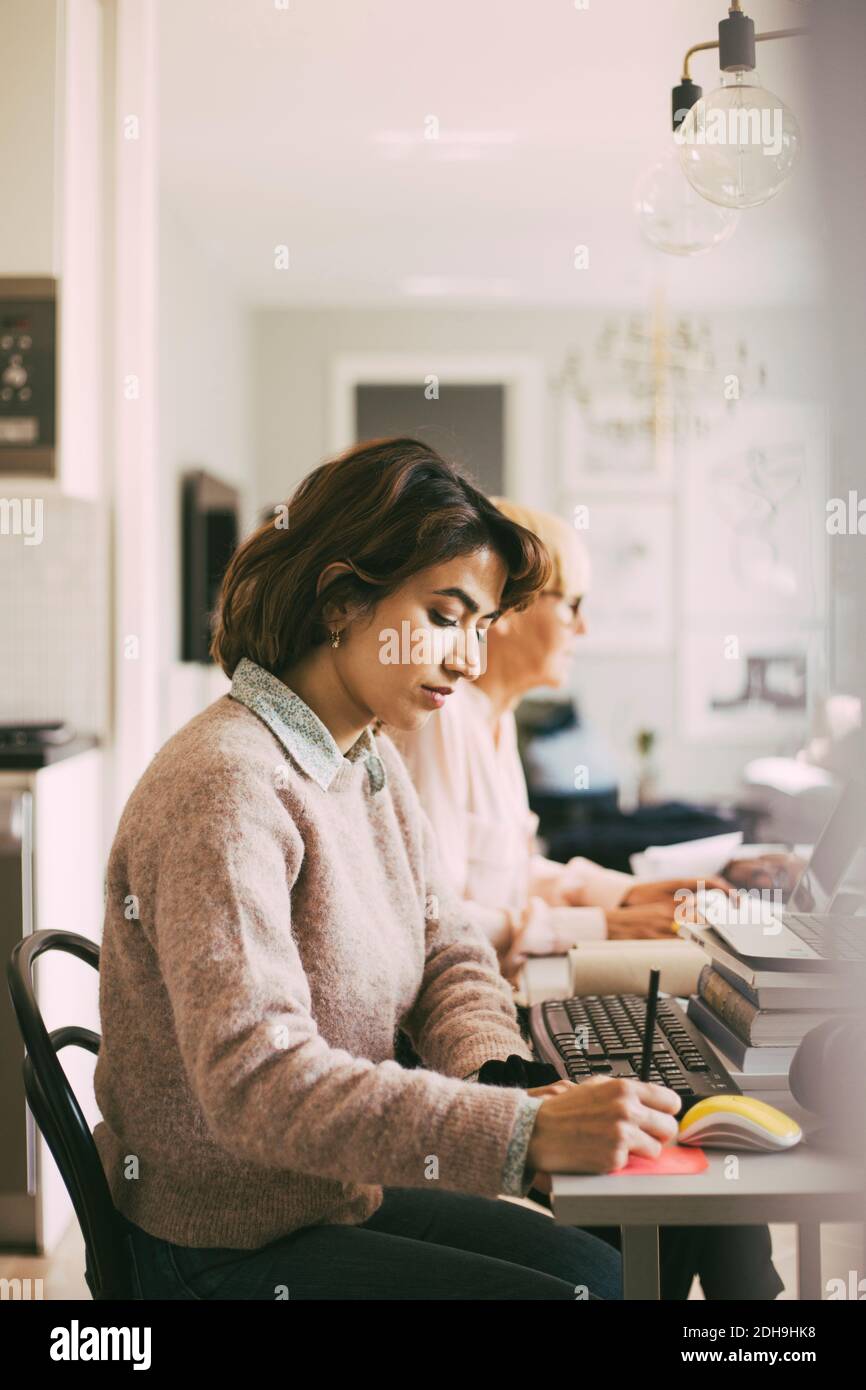 Two women work in hi-res stock photography and images - Alamy