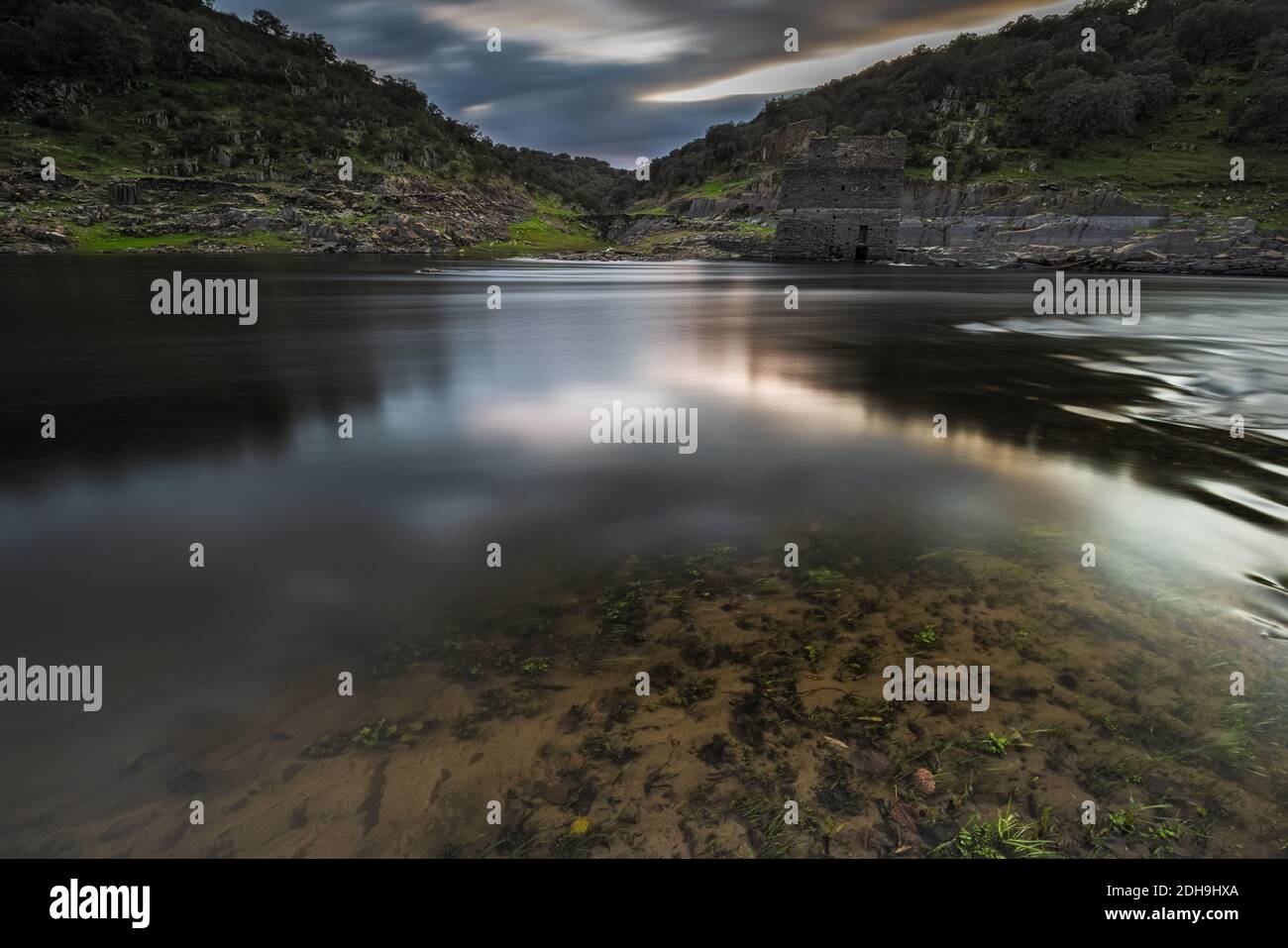 A beautiful sunset landscape on the bank of the Alagon River in Spain ...