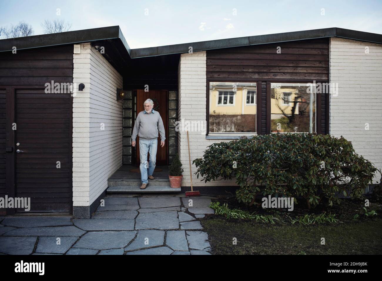 Man Walking Out House High Resolution Stock Photography and Images - Alamy