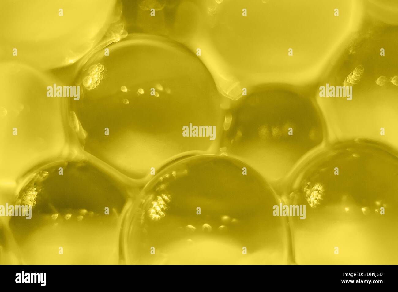 Abstract yellow texture, crystalline balls of hydrogel for the ...