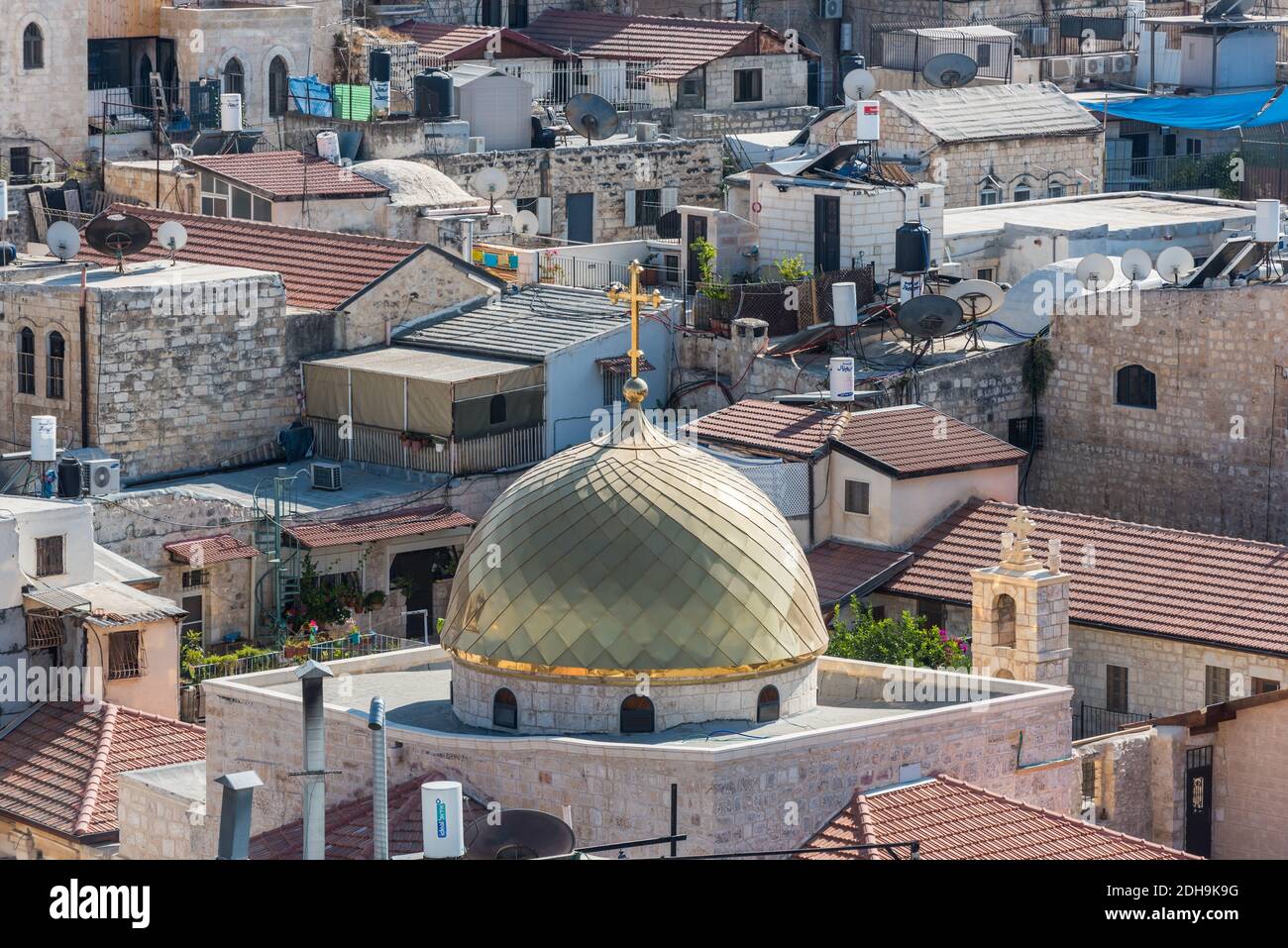 Aerial view of the old city with lots of roofs of Jerusalem. with green ...