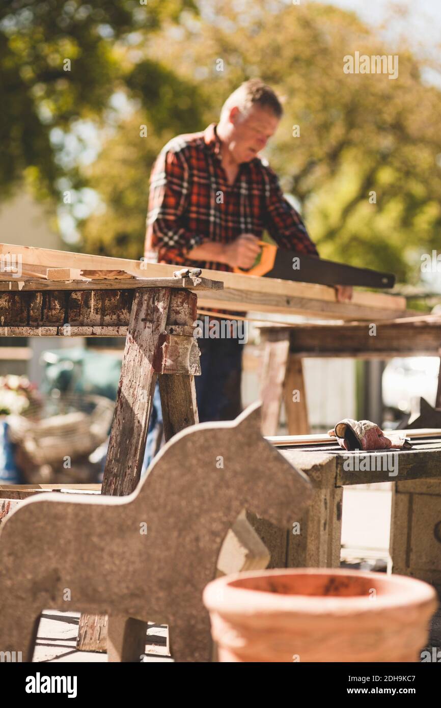 Hand saw person hi-res stock photography and images - Alamy
