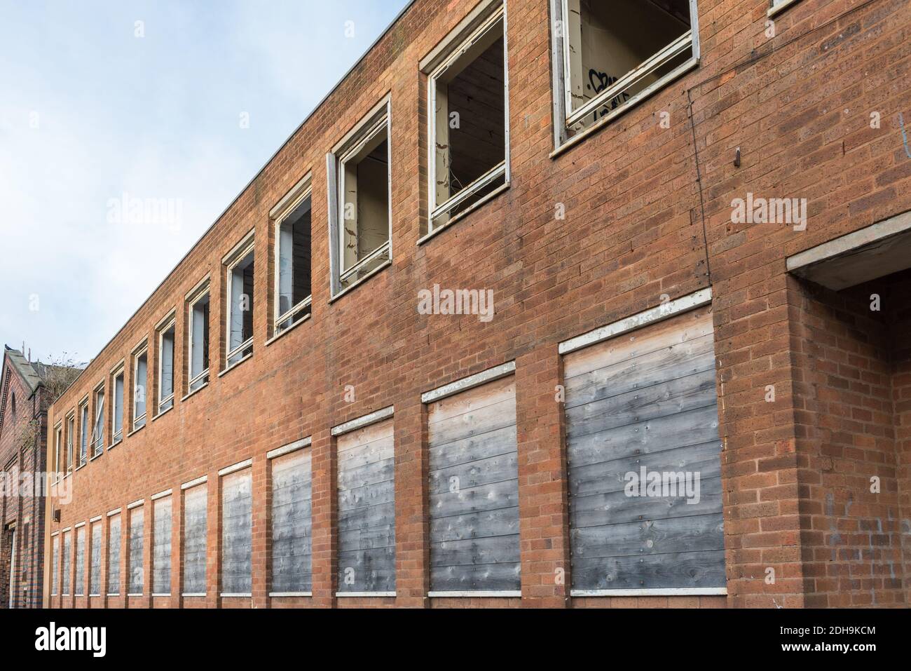 Derelict factories and fly tipped rubbish line Abberley Street in Cape ...
