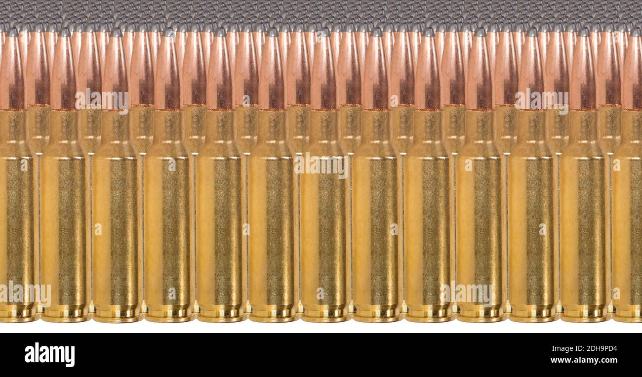 Big volume or rifle bullets that are arranged in rows Stock Photo - Alamy