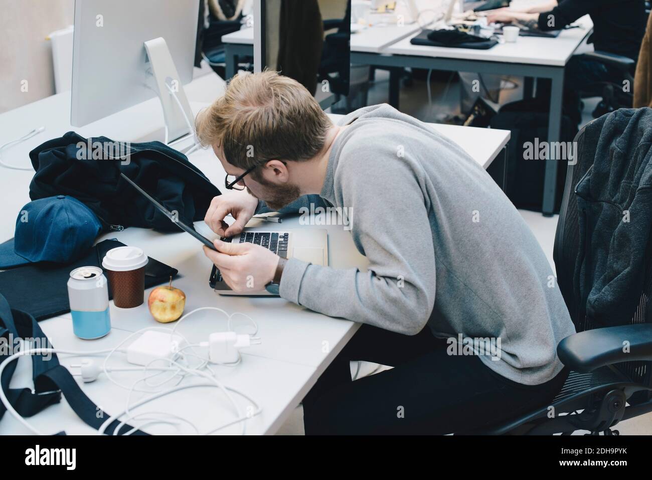 Person fixing an office chair hi-res stock photography and images - Alamy