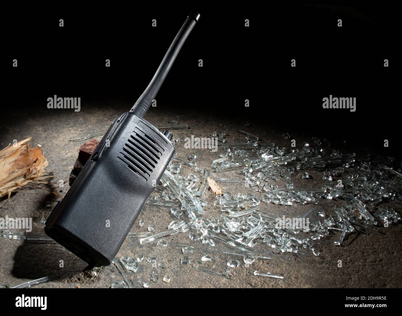 Disaster walkie talkie with broken glass and room for text Stock Photo ...