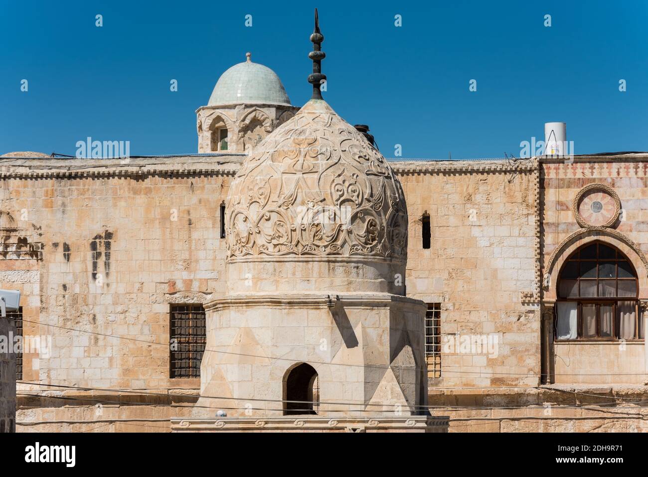 Islamic dome and buildings surrounding the square of the Golden Dome of ...