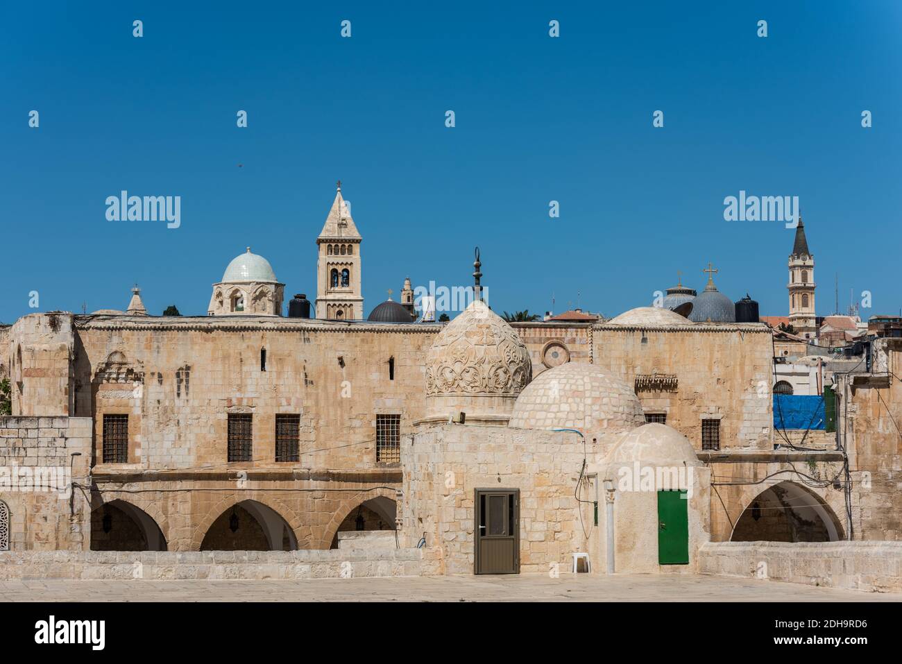 Islamic dome and buildings surrounding the square of the Golden Dome of ...