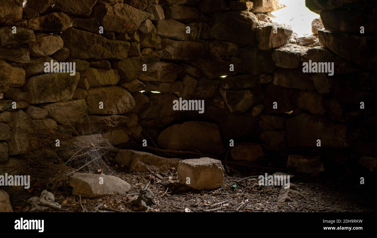 The inside of an abandoned small stone shelter handmade years ago Stock ...