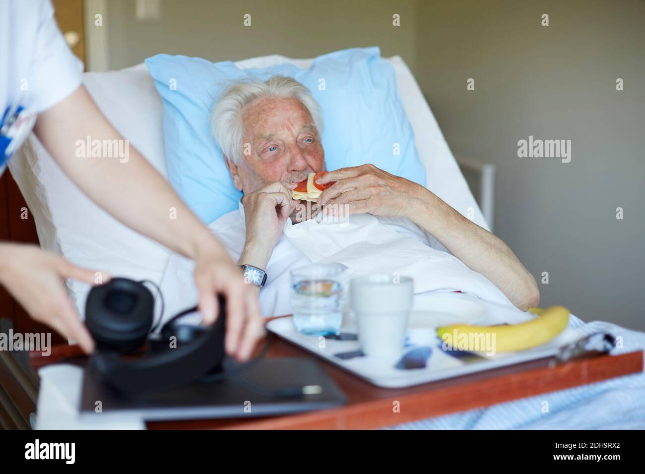 Female Nurse Serving Food Patient High Resolution Stock Photography and ...
