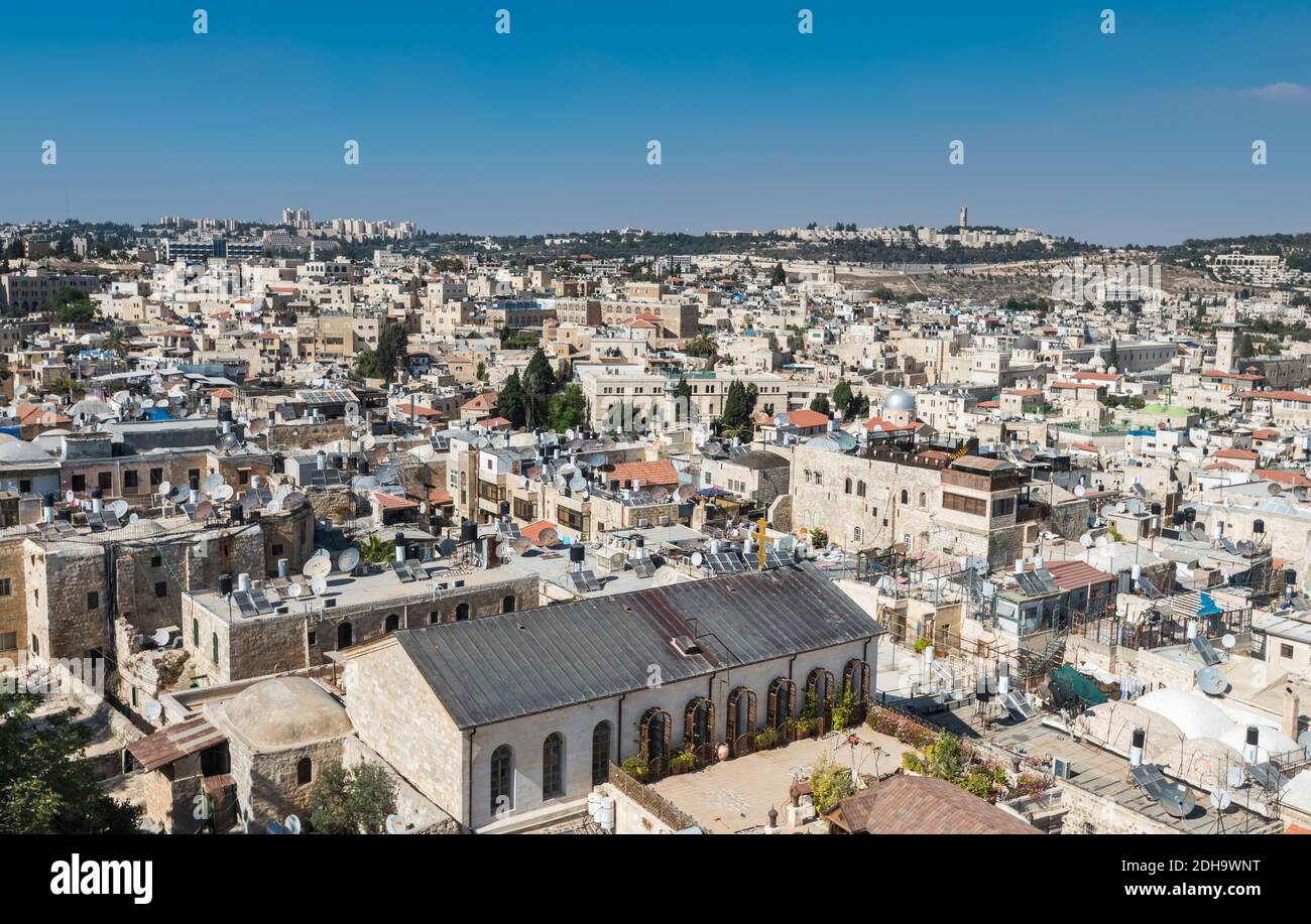 Aerial view of rooftops of buildings in the old city with blue sky of ...