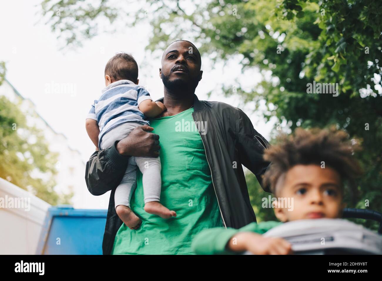 Walking children low angle city hi-res stock photography and images - Alamy