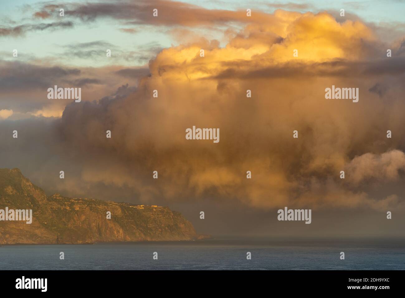 heavy mountain over island Stock Photo - Alamy