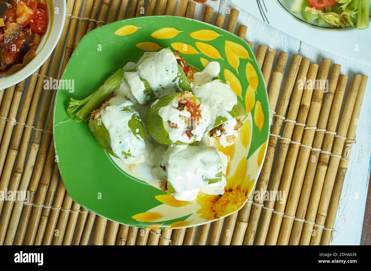 Kolokithakia Gemista with Avgolemono Sauce Stock Photo - Alamy