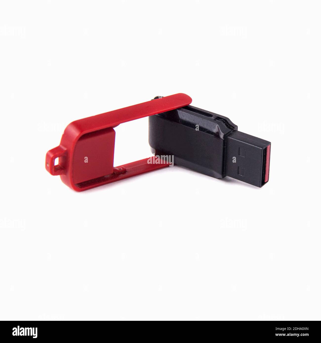 Red and black plastic USB flash drive isolated on white background ...