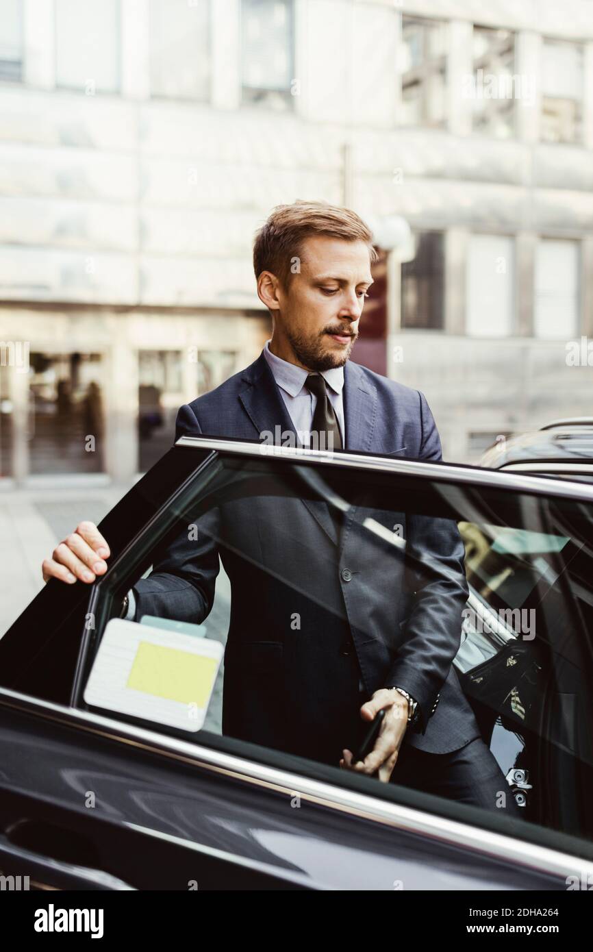 Person entering car hi-res stock photography and images - Alamy