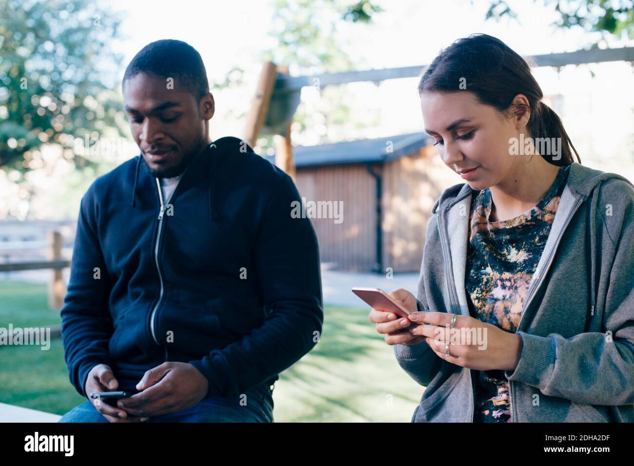 Two phones held up hi-res stock photography and images - Alamy