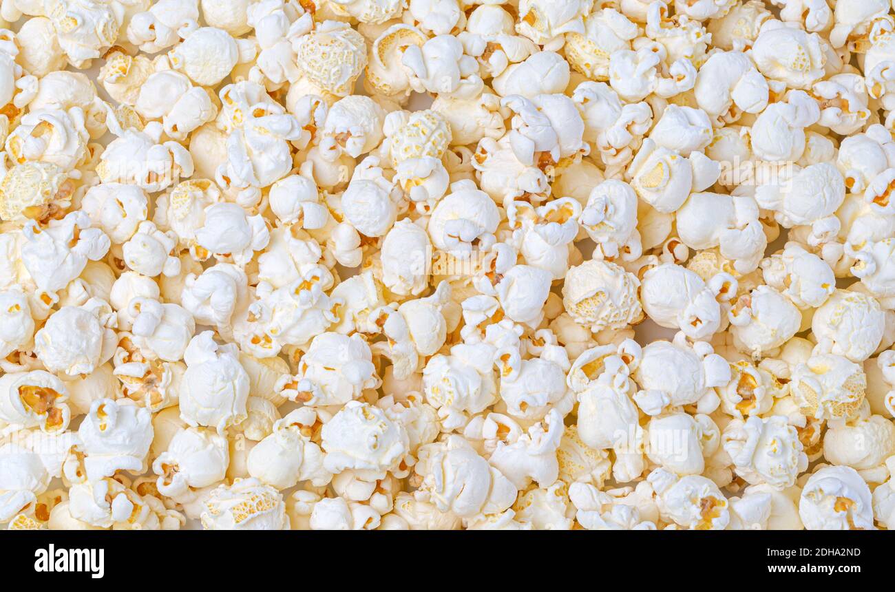 Scattered salted popcorn, texture background Stock Photo - Alamy