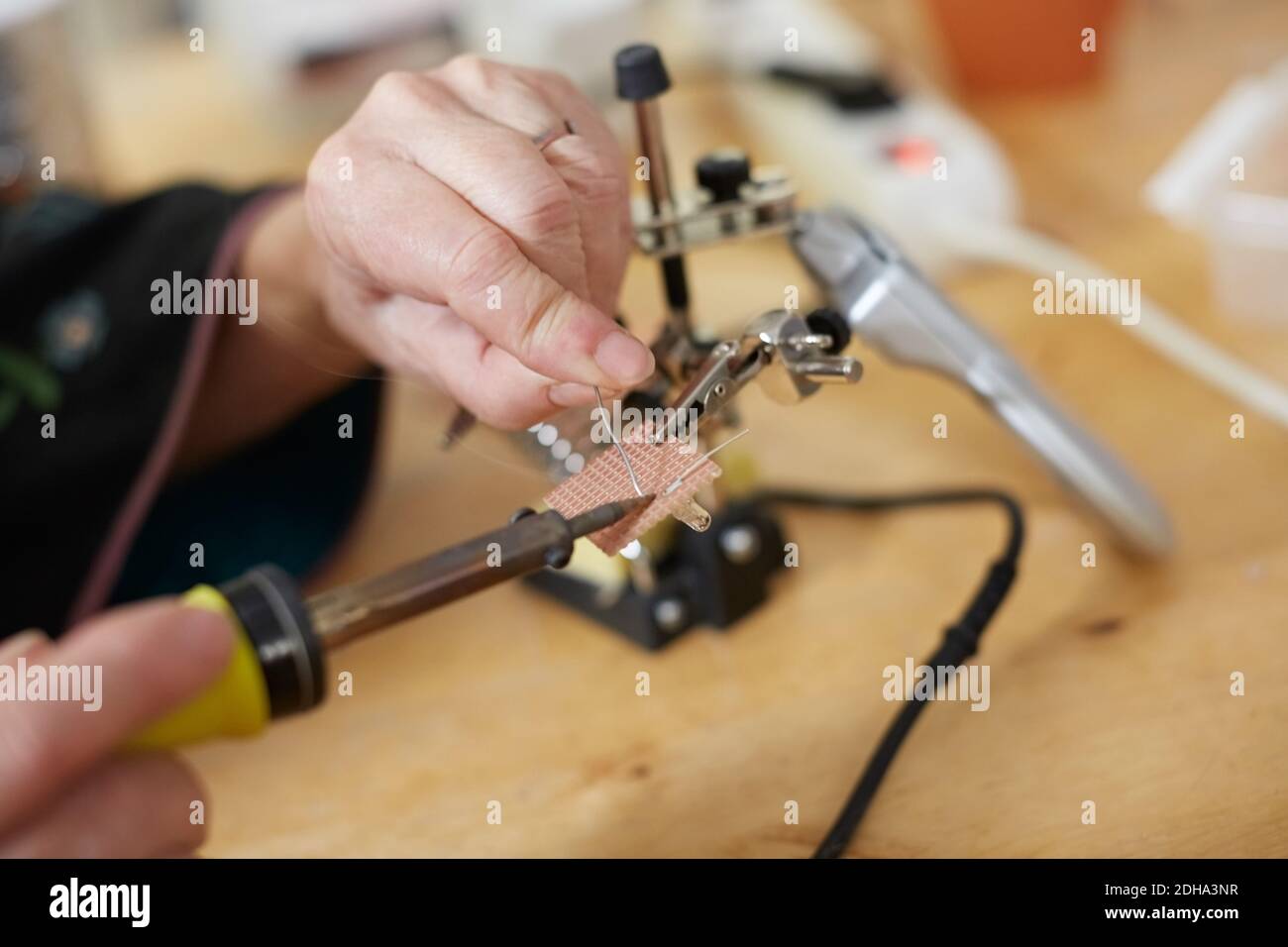 Human hand holding soldering iron hi-res stock photography and images ...