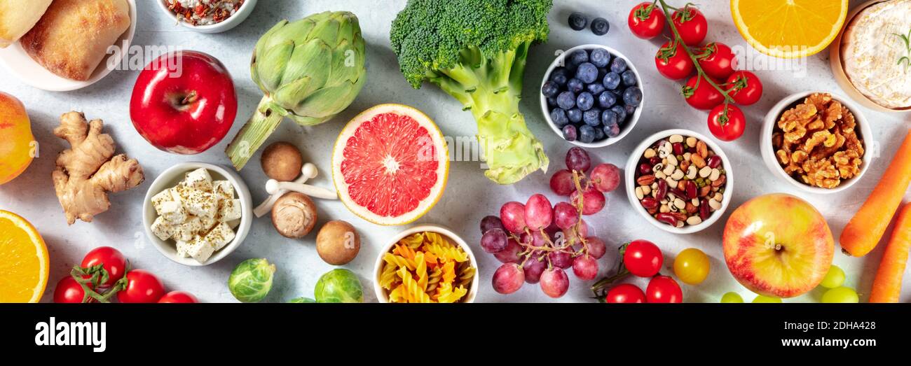 Vegetarian food panorama. Healthy organic fruit and vegetables, shot ...