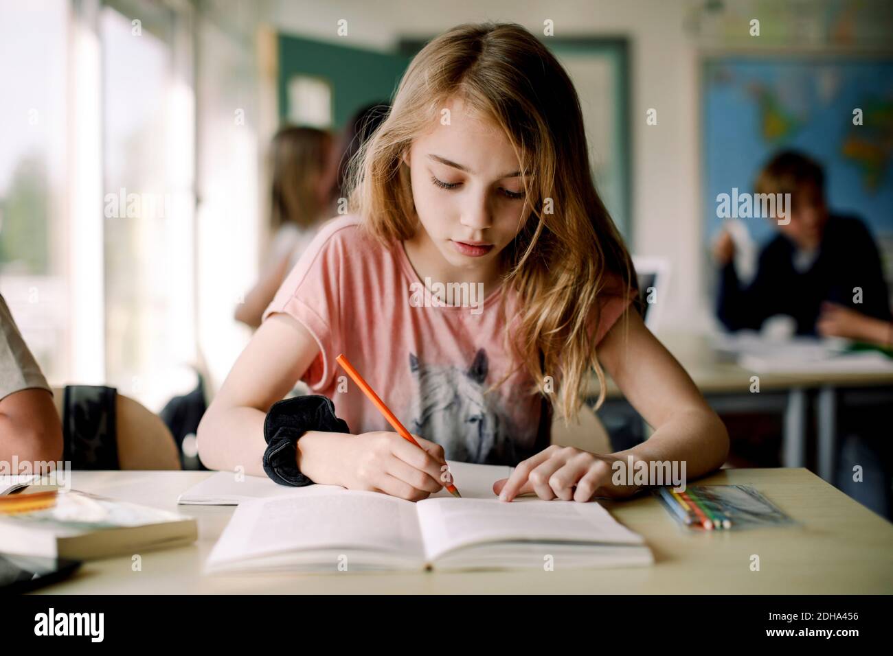 Female junior high student sitting hi-res stock photography and images ...