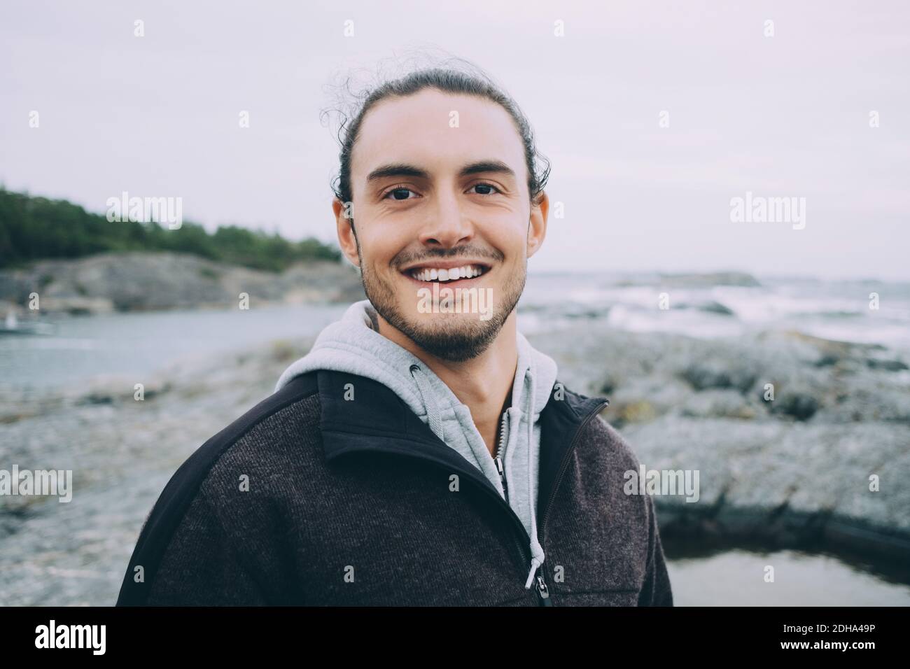 Portrait young man beach hi-res stock photography and images - Alamy