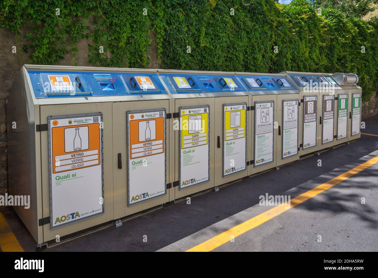 Ten bin recycling unit in street in Aosta, Aosta Valley, Italy. There ...