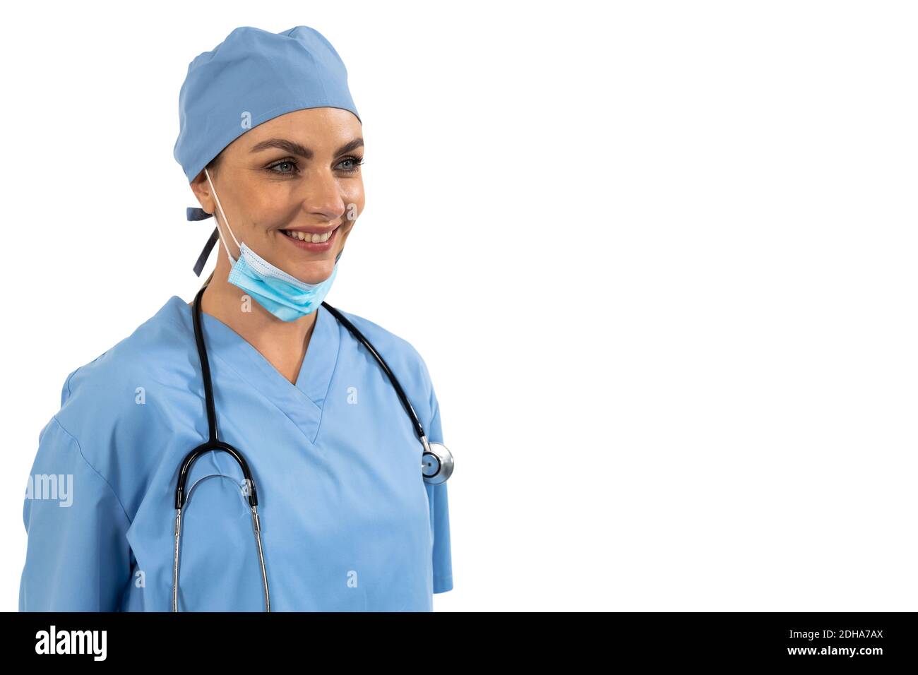 Female surgeon smiling against white background Stock Photo - Alamy