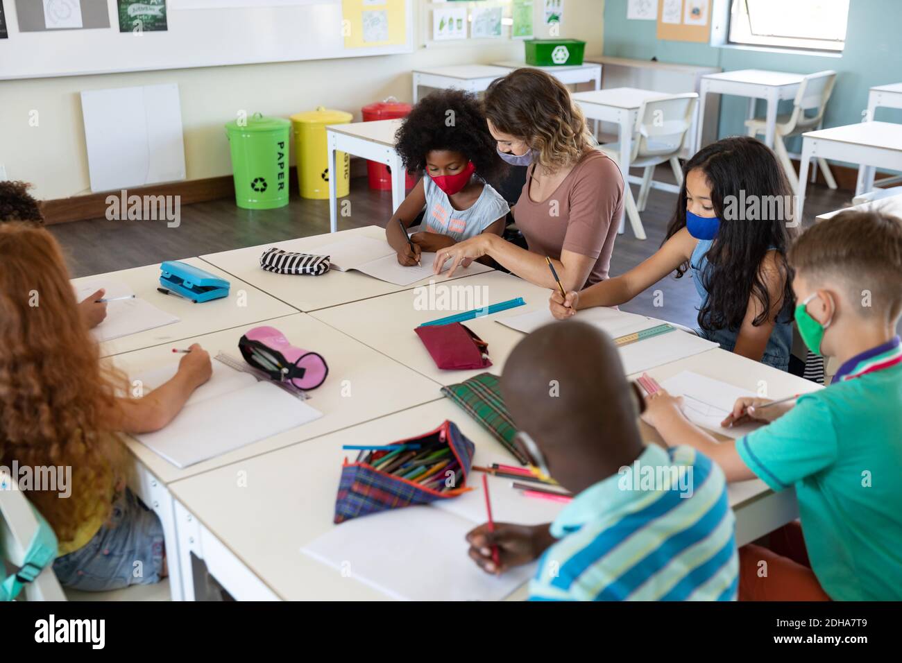 Female teacher wearing face mask hi-res stock photography and images ...