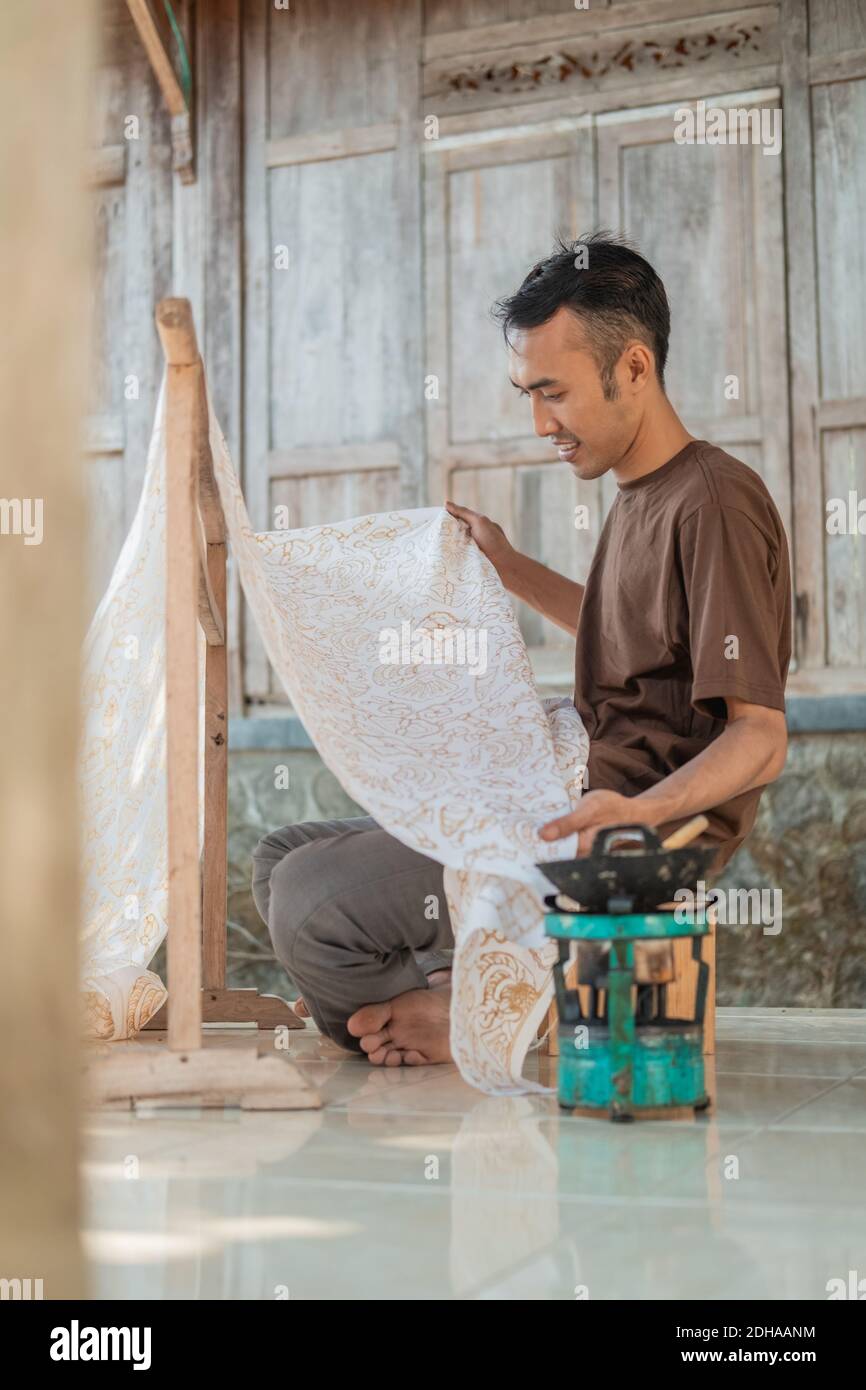 portrait young men see the results of these batik drawings. traditional ...