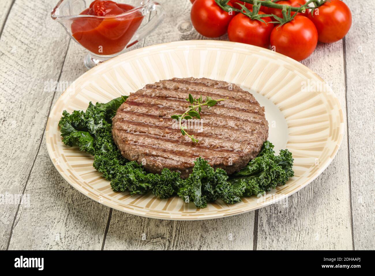 Grilled tasty beef cutlet for burger Stock Photo - Alamy